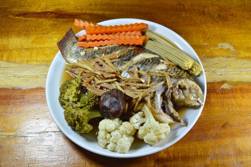 Steamed Mango Fish with Slice Ginger and Vegetable in Soy Sauce on ...