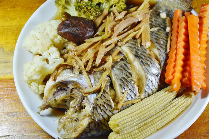 Steamed Mango Fish with Slice Ginger and Vegetable in Soy Sauce on ...