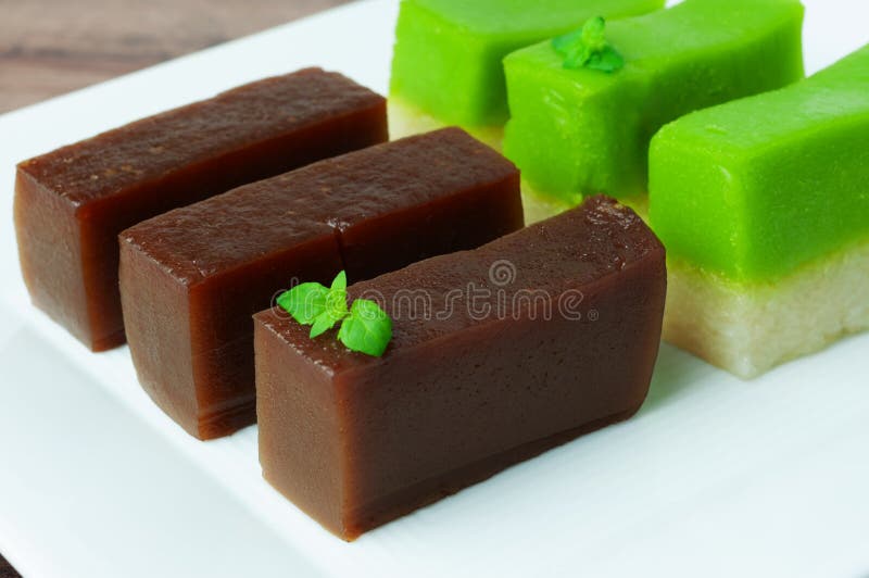 Steamed Palm Sugar Cake and Pandan Tray Cake on a Plate Stock Image ...