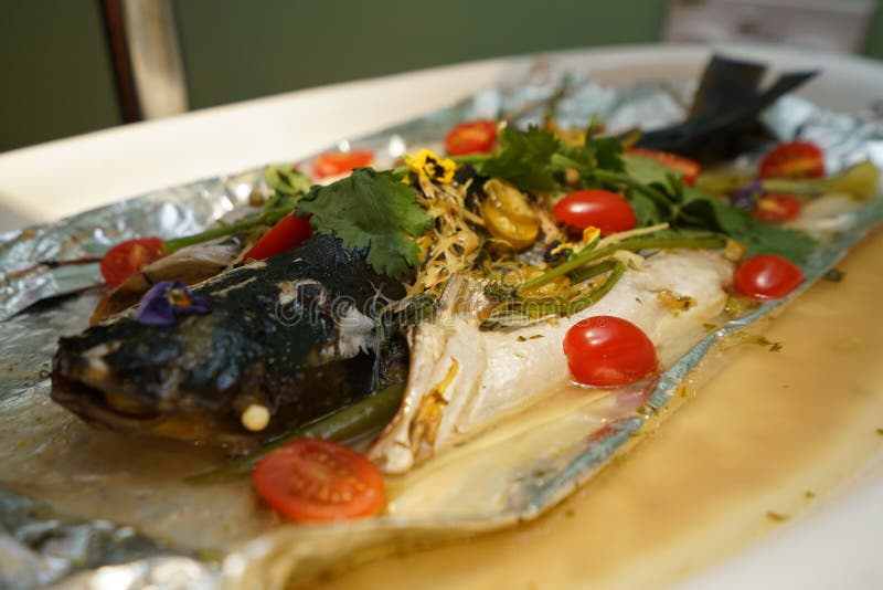 Steamed Patin Fish stock photo. Image of food, dish - 219779300