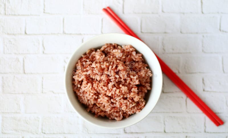 Steamed red rice stock photo. Image of health, background - 227278244