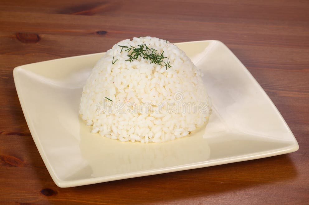 Steamed rice in the plate stock photo. Image of cooked - 184560236