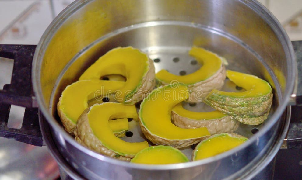 Steamed squash in steamer stock image. Image of closeup - 163029689