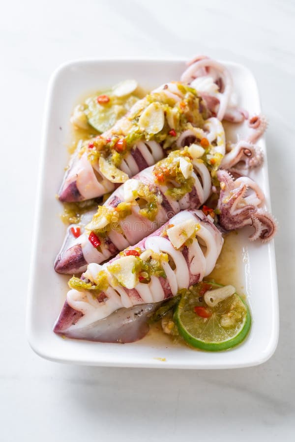 Steamed Squids with Spicy Chili and Lemon Sauce Stock Photo - Image of ...