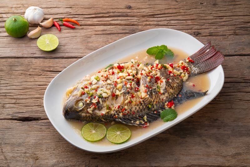 Steamed Tilapia Fish in Spicy Lime Soup Stock Photo - Image of spicy ...