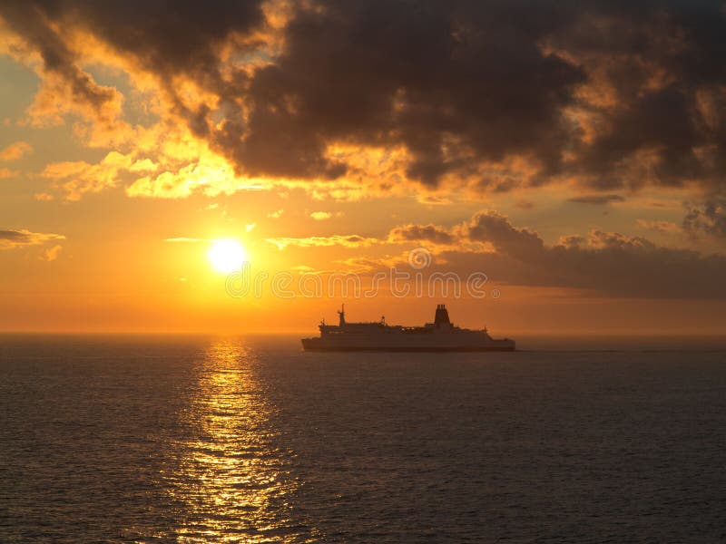 Steamer sailing on the sea stock photo. Image of glow - 29577720