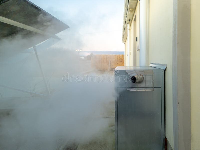 Steaming Central Heating Boiler Outside House in Ireland Stock Photo ...