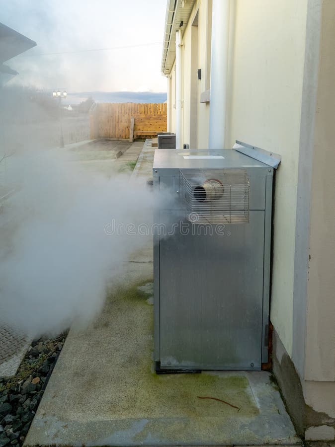 Steaming Central Heating Boiler Outside House in Ireland Stock Photo ...