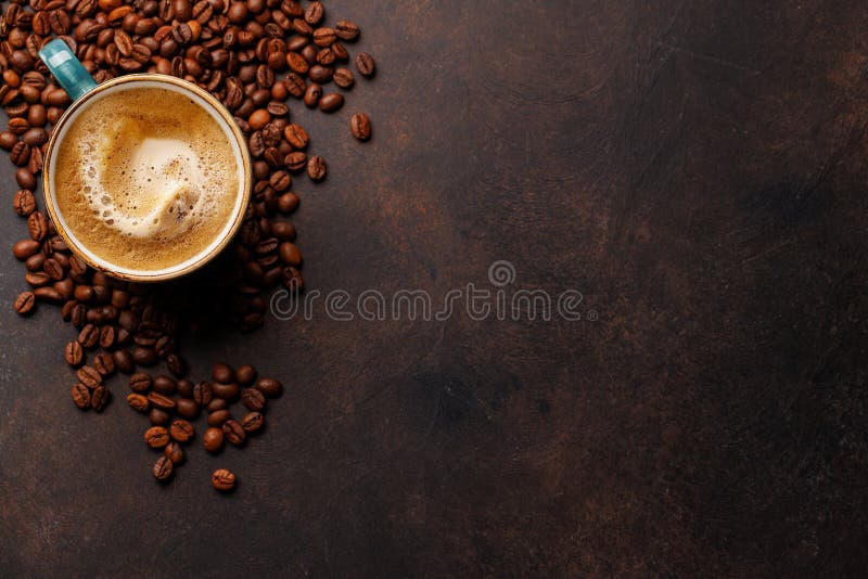 Steaming Cup of Aromatic Tea in a Clear Glass Cup on a Reflective Black ...