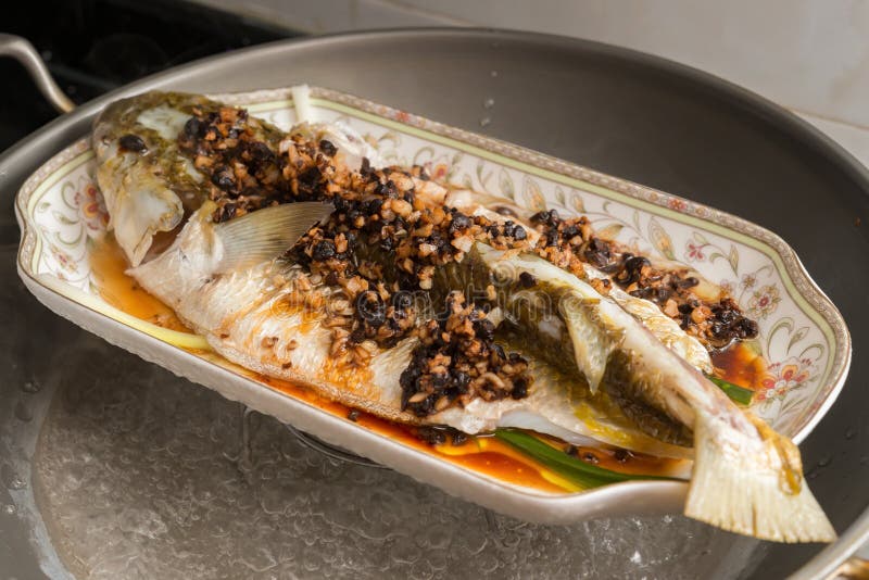 Steaming a Fresh Fish on Pot at Home Stock Image - Image of meal, home ...