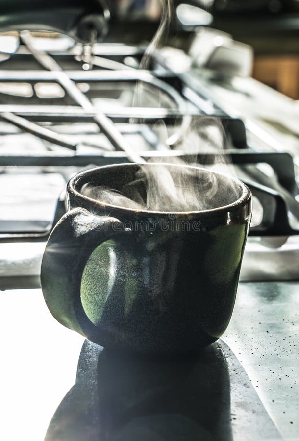 Steaming mug of coffee stock photo. Image of home, steaming - 121599168