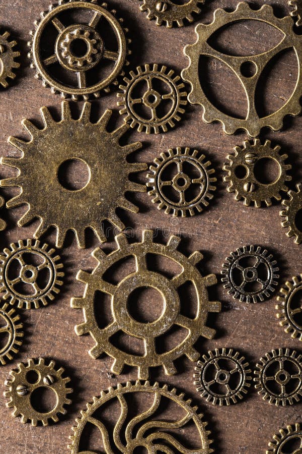 Steampunk Mechanical Cogs Gears Wheels on Wooden Background Stock Photo ...