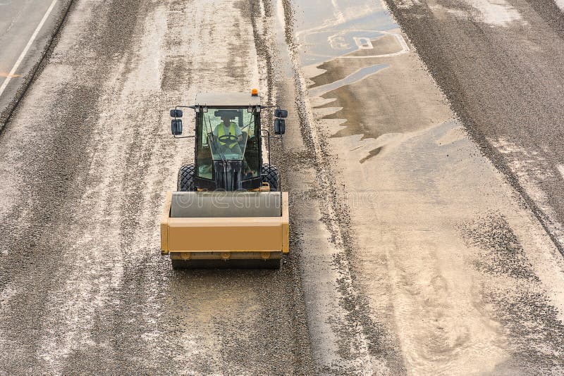 Steamroller Doing Road Construction WorkPreparation of Surface with ...