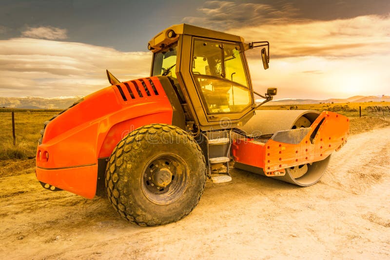 Steamroller Performing Earth Compaction Work for Later Asphalting Stock ...
