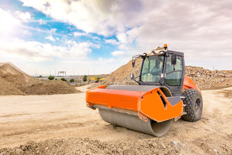 Steamroller Performing Earth Compaction Work for Later Asphalting Stock ...