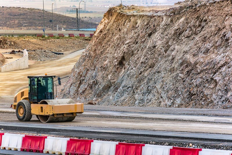 Steamroller Performing Earth Compaction Work for Later Asphalting Stock ...