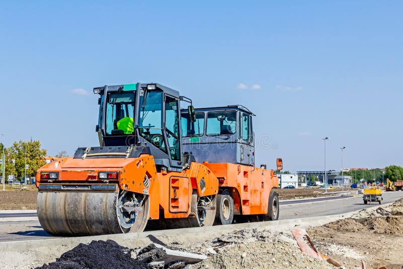 Steamrollers are Parked at Building Site. Machinery for Road Con Stock ...