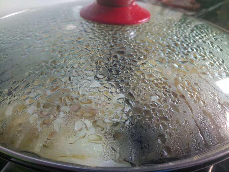 Steamy sauce pan lid stock photo. Image of sauce, droplets - 104632002