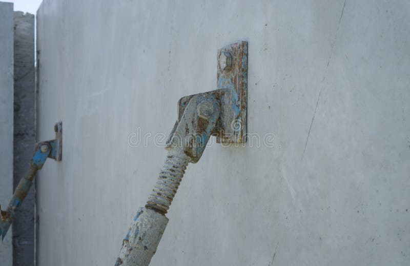 The Steel Arm Supporting on the Precast Concrete Wall Stock Photo ...