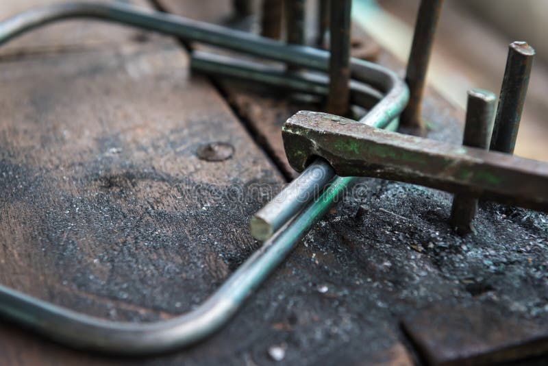 Steel bar bending stock photo. Image of hardware, action - 148450312