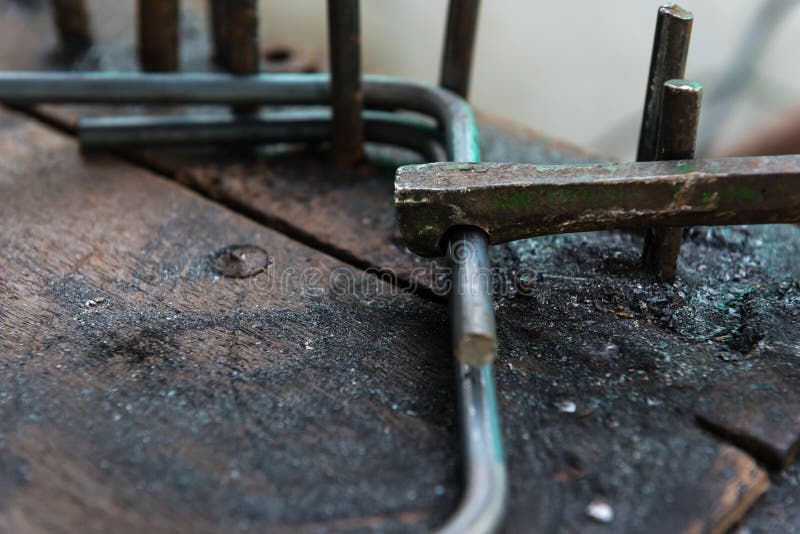 Steel bar bending on table stock photo. Image of industry - 148449550