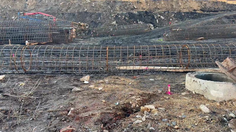 Construction Site Featuring Steel Reinforcement Bars Along with ...