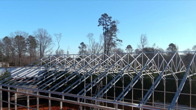 Construction Progress of a Steel Framework for a Large Building during ...