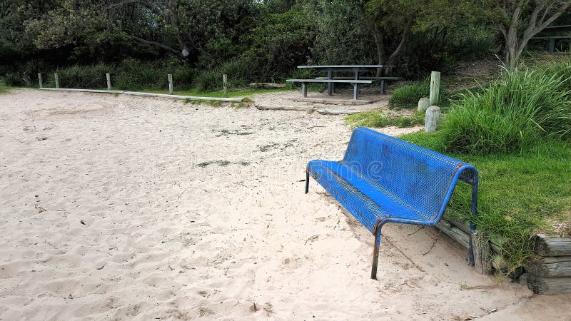 A Steel Blue Bench on the Sand Stock Image - Image of seat, furniture ...