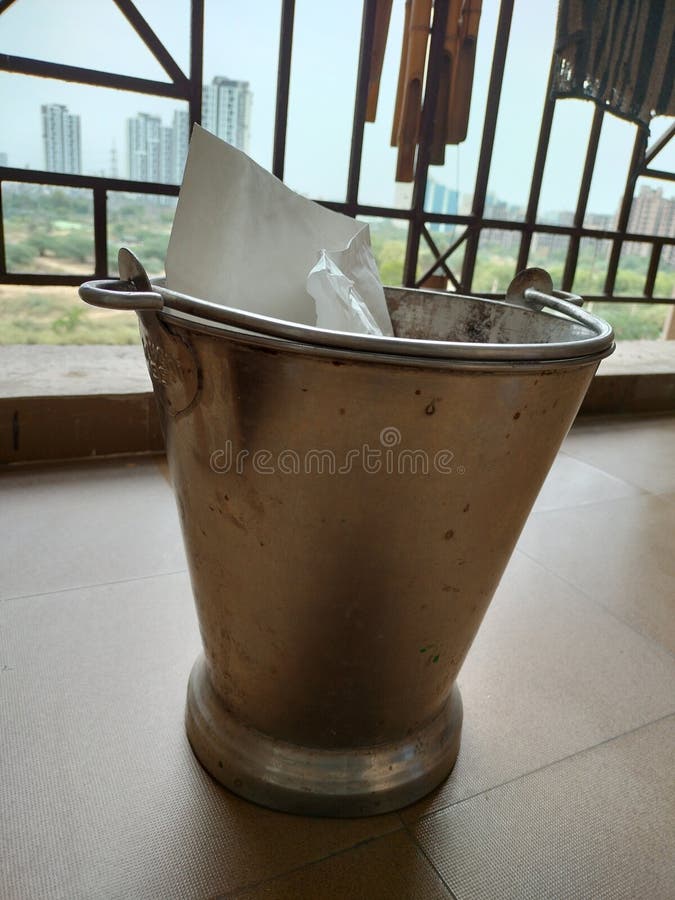 A Steel Bucket with Some Waste Paper Stock Photo - Image of iron, drink ...