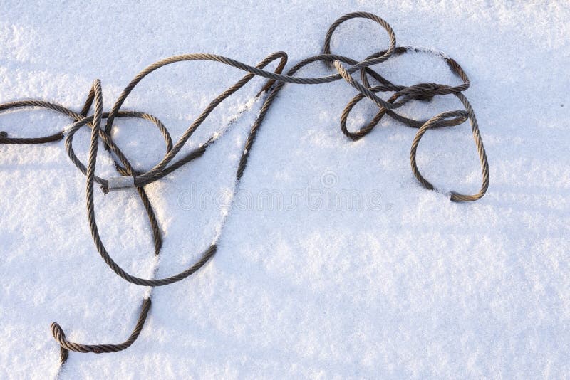 Steel wire rope in snow stock image. Image of flexibility - 152244913