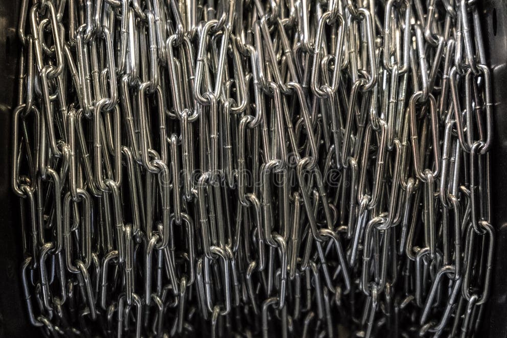 Steel Chain in Roll Coil Close-up Stock Photo - Image of rows, group ...