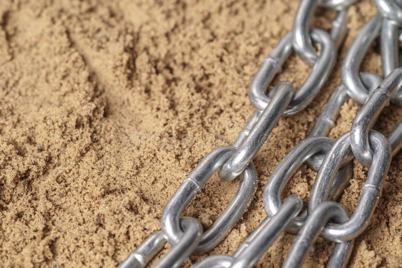 Steel Chains Three Pieces on the Sand Brown Stock Image - Image of ...