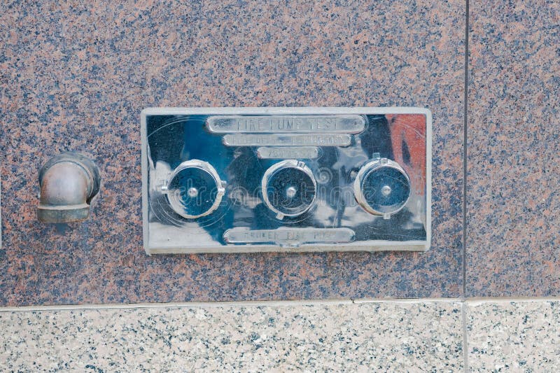 Steel, Chrome Fire Hydrant in Granite Wall of Modern Building Editorial ...