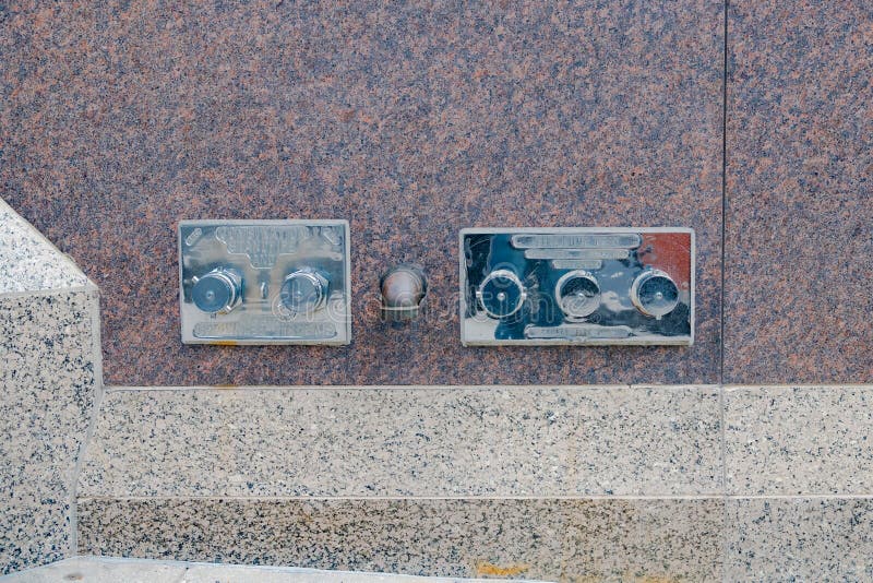 Steel, Chrome Fire Hydrant in Granite Wall of Modern Building Stock ...