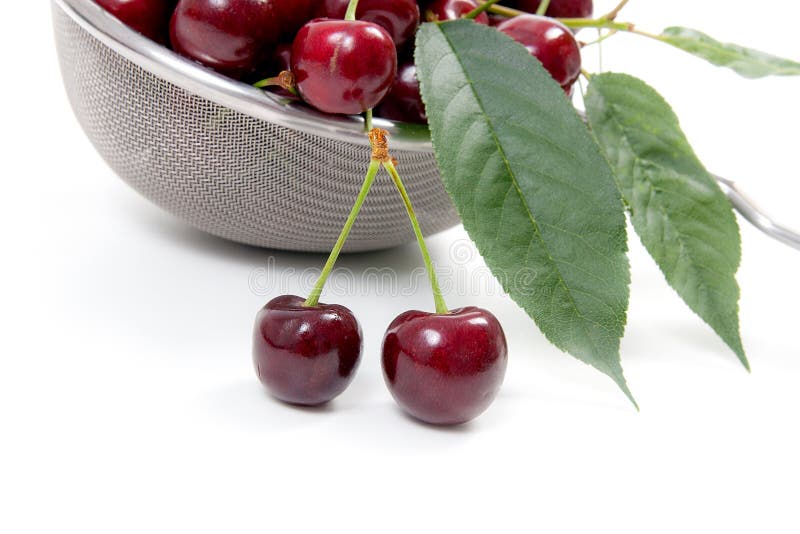 Steel Colander with Red Sweet Cherry Isolated on a White Background ...