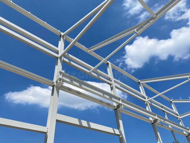Steel Columns and Beams on a Construction Site Under a Blue Sky with ...