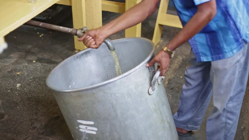 Steel Container Being Filled with an Extracted or Purified Liquid Soap ...