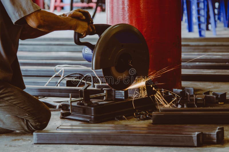 Steel cutting workers stock image. Image of engineering - 163144547