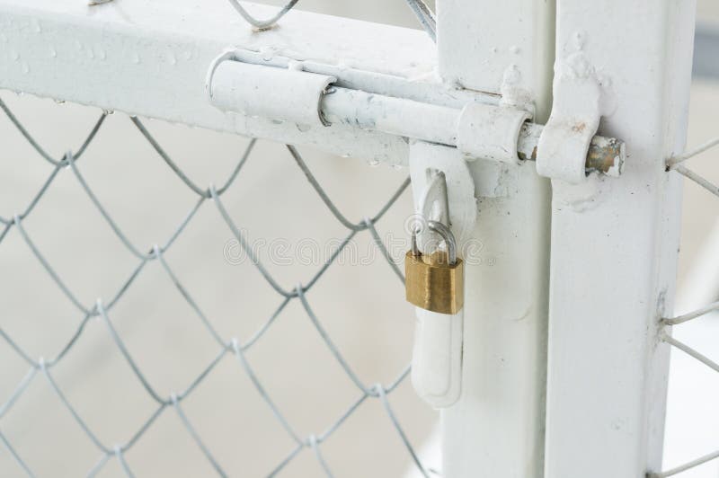 Steel Door with Locked Gate Stock Image - Image of locked, lock: 75983203