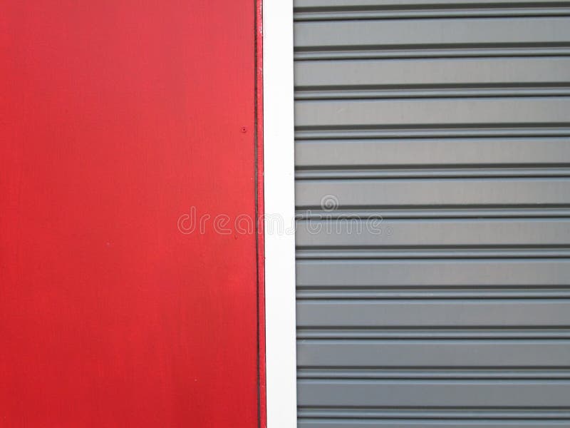 Steel doors with red wall stock image. Image of metal - 74331221