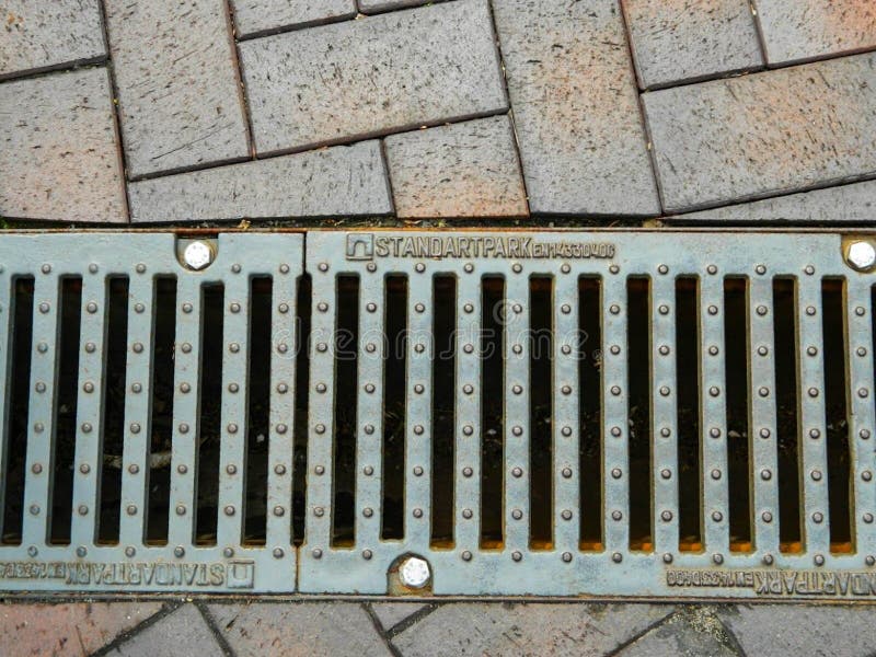 Steel Drain Grate on the Tile Pathway in the Large University ...