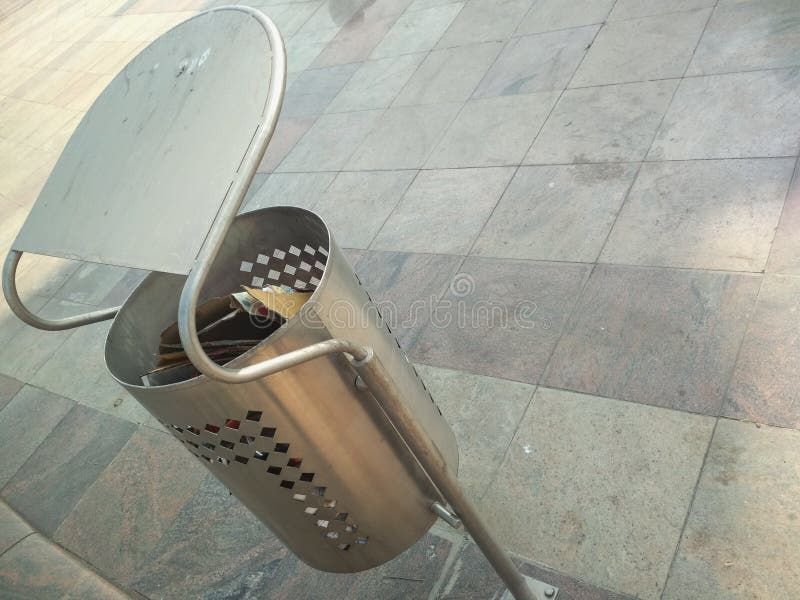 Steel dustbin stock photo. Image of outdoor, tiled, dustbin - 135168558