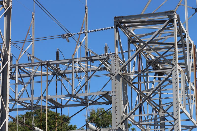 Steel Electrical Power Grid Under a Bright Blue Sky Stock Image - Image ...