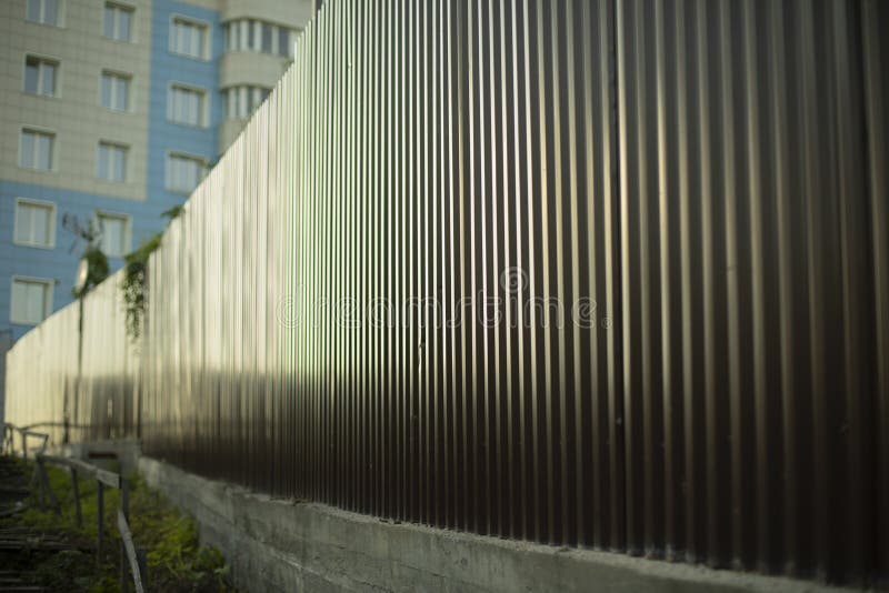 Steel Fence. the Fence is High on the Street Stock Image - Image of ...