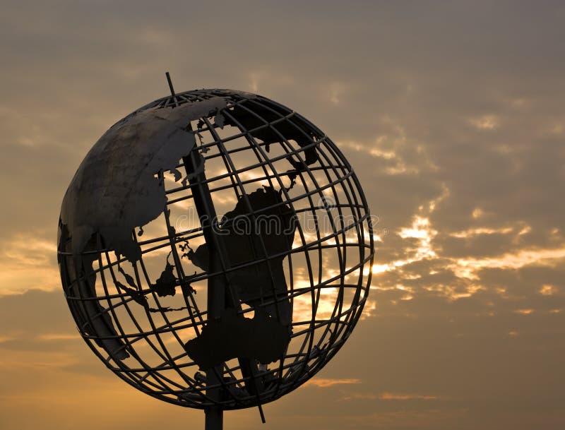 Steel globe at sunset stock image. Image of world, backlighting - 11036903