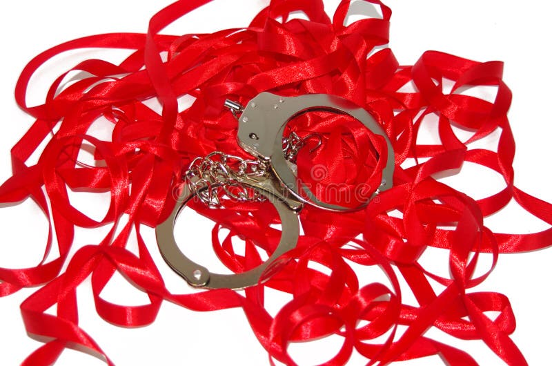 Steel Handcuff on Red Ribbon Stock Photo - Image of manacle, arrest ...