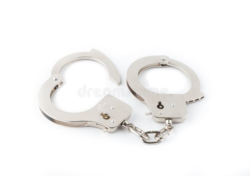 Steel Handcuffs on a Green Background Stock Photo - Image of shiny ...
