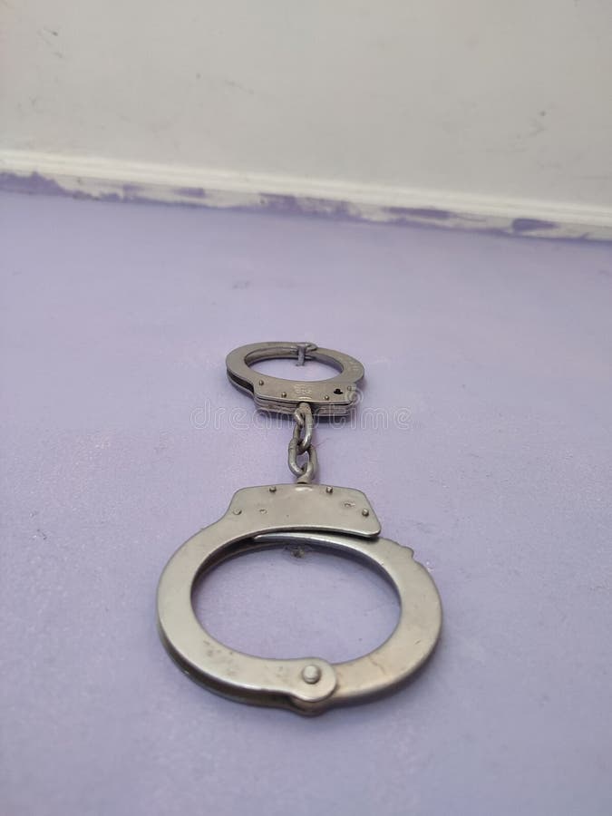 Steel Handcuffs are Strong and Good for Security Stock Photo - Image of ...