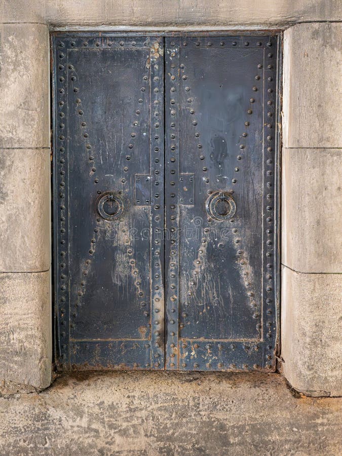 Steel Industrial Doors with Rivet Patterns Stock Image - Image of ...