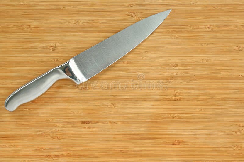 Steel Kitchen Knives on a Wood Board with Copy Space, Top View Stock ...